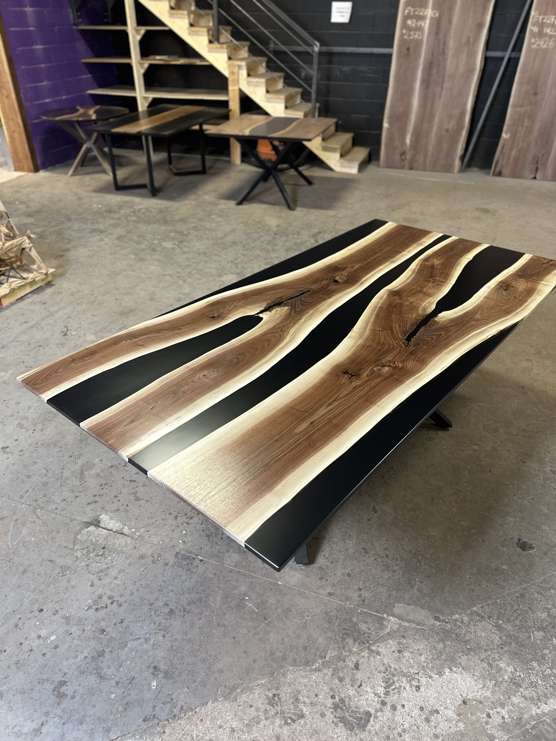 Walnut Dining Table with Black Epoxy Rivers - Anglewood Furniture